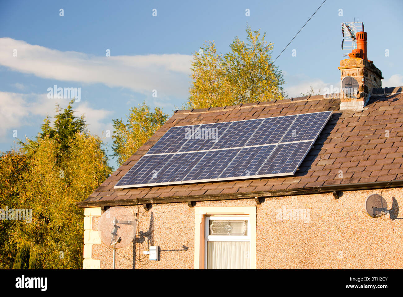 Solar panels on the roof of a terraced house in Clitheroe, Lancashire ...