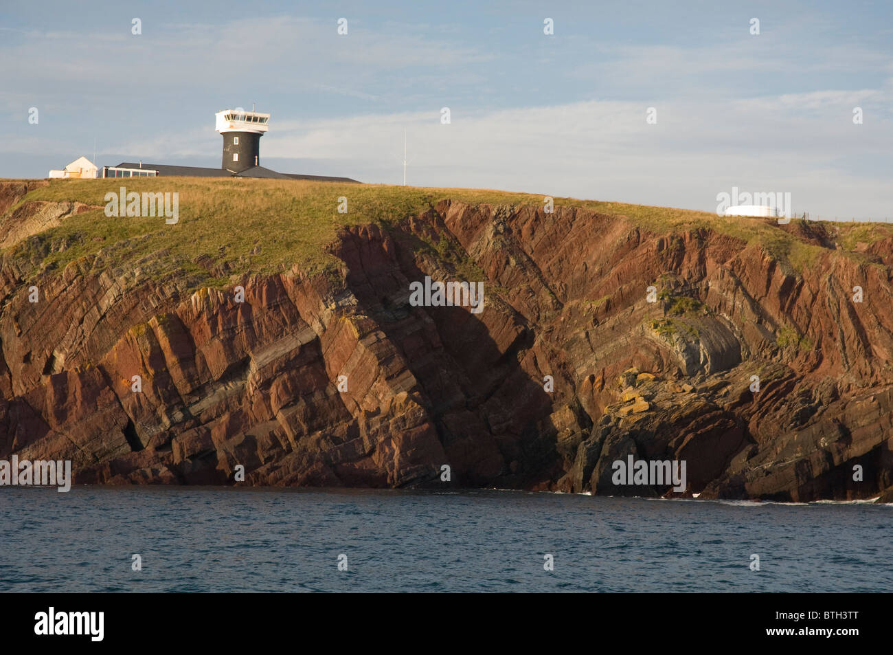 Old Red Sandstone folds in cliff, St. Anne's Head, Pembrokeshire, Wales ...