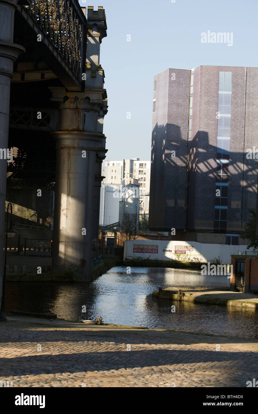Iron Railway Viaduct factory and modern apartment block Castlefield ...