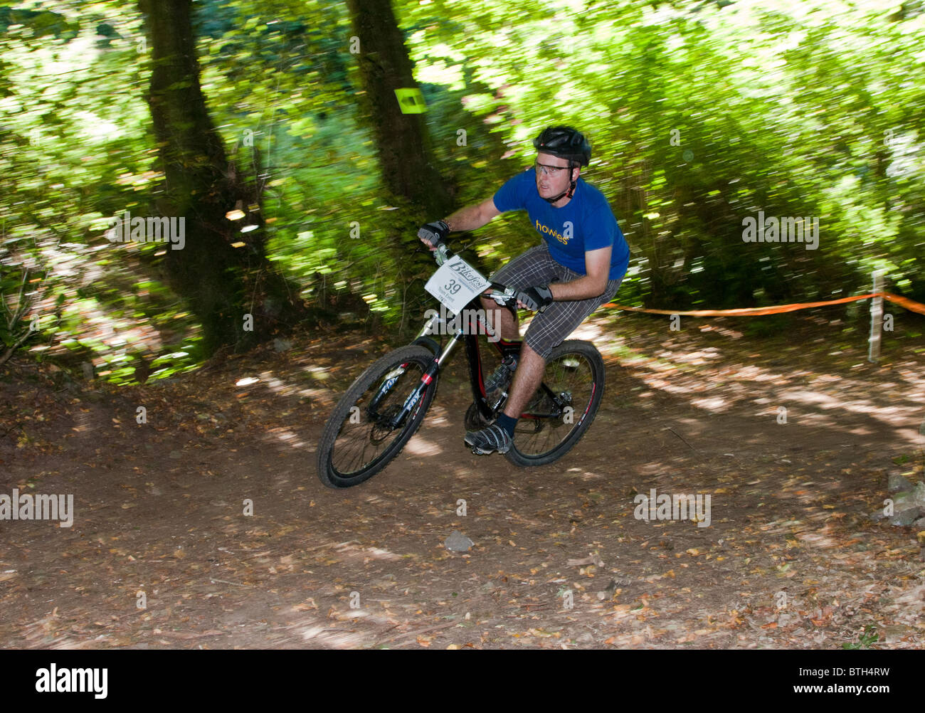 Competitor in a Mountain Biking Trial Stock Photo - Alamy