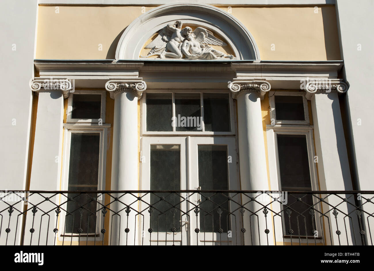 Facade of a building with a balcony. The building is constructed 1850 ...