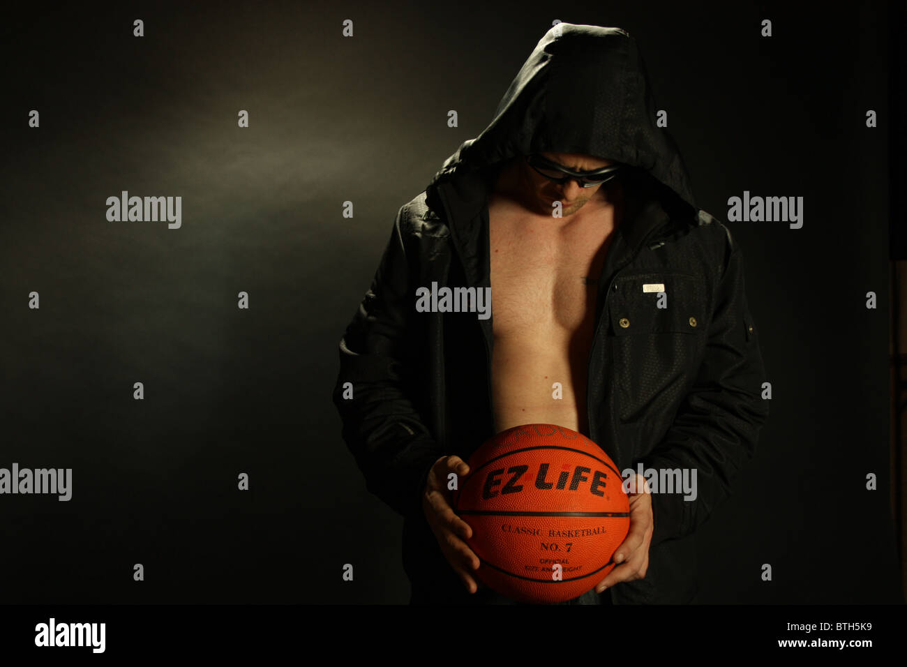 young male in studio shoot , looking well toned , modern,and healthy ...