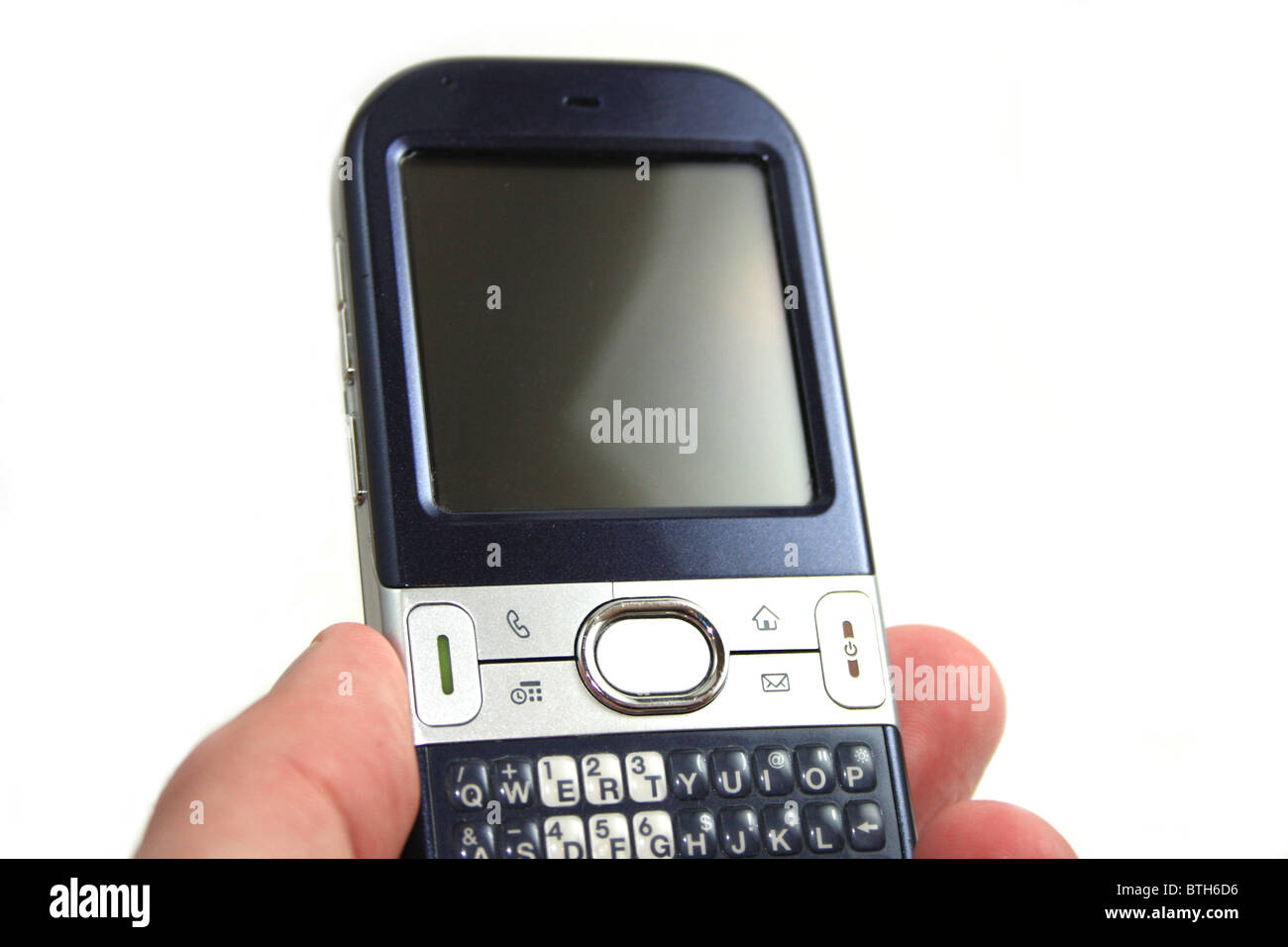 Hand holding PDA Smartphone on white background Stock Photo - Alamy