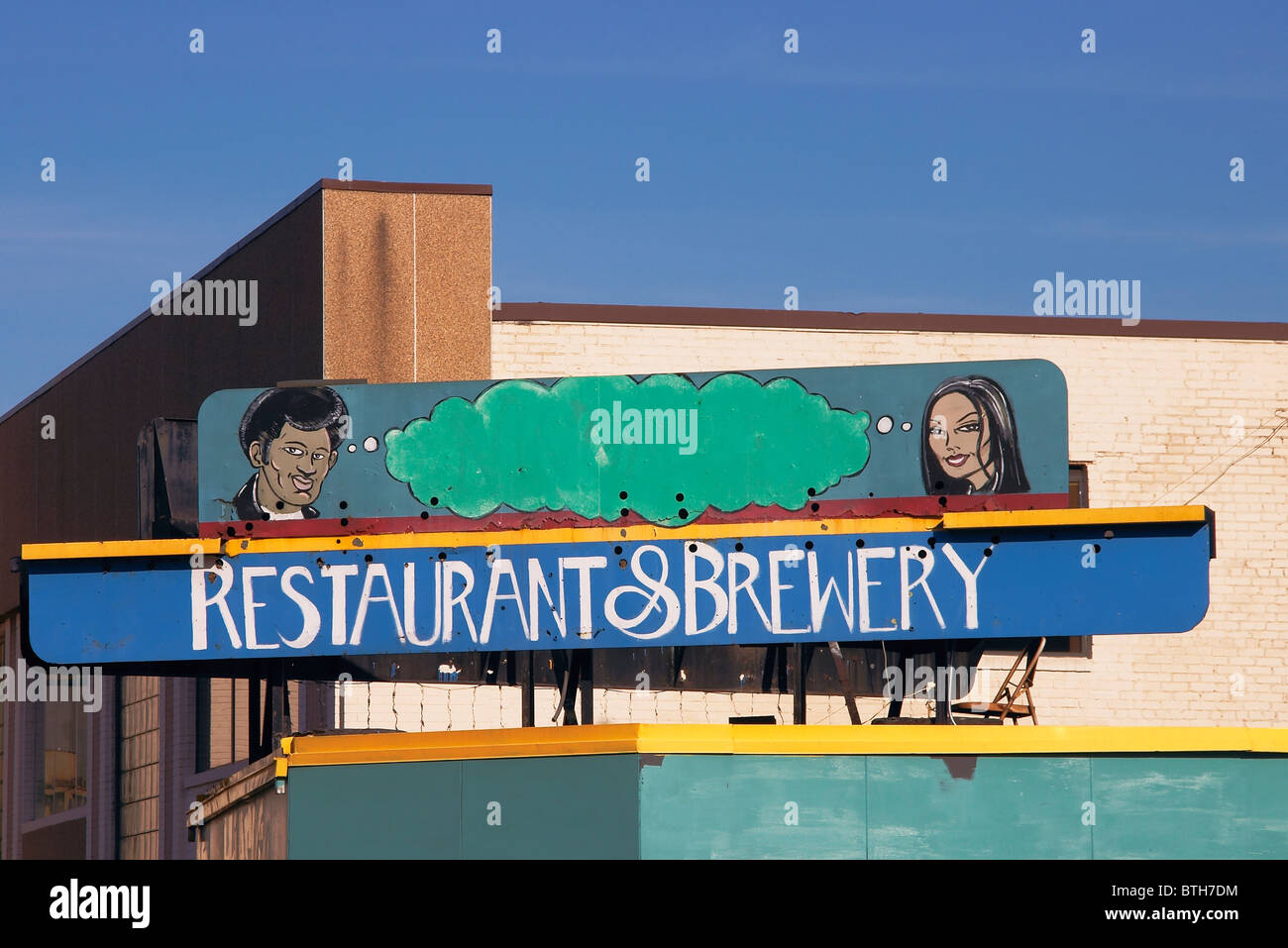 A sign with a thought bubble above a defunct restaurant Stock Photo - Alamy