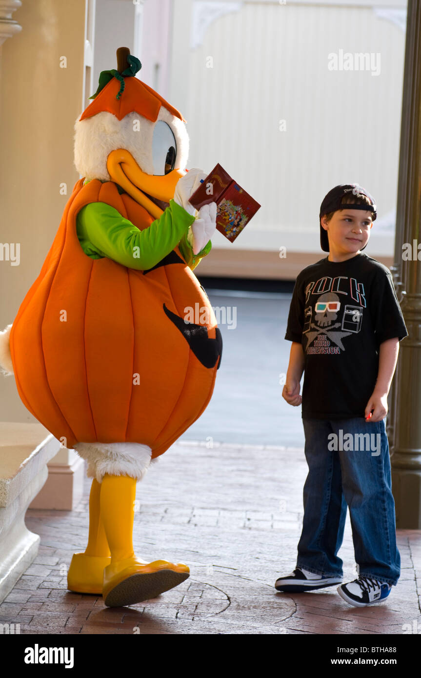 Donald Duck in Halloween Pumpkin Costume at Disneyland Amusement Park ...