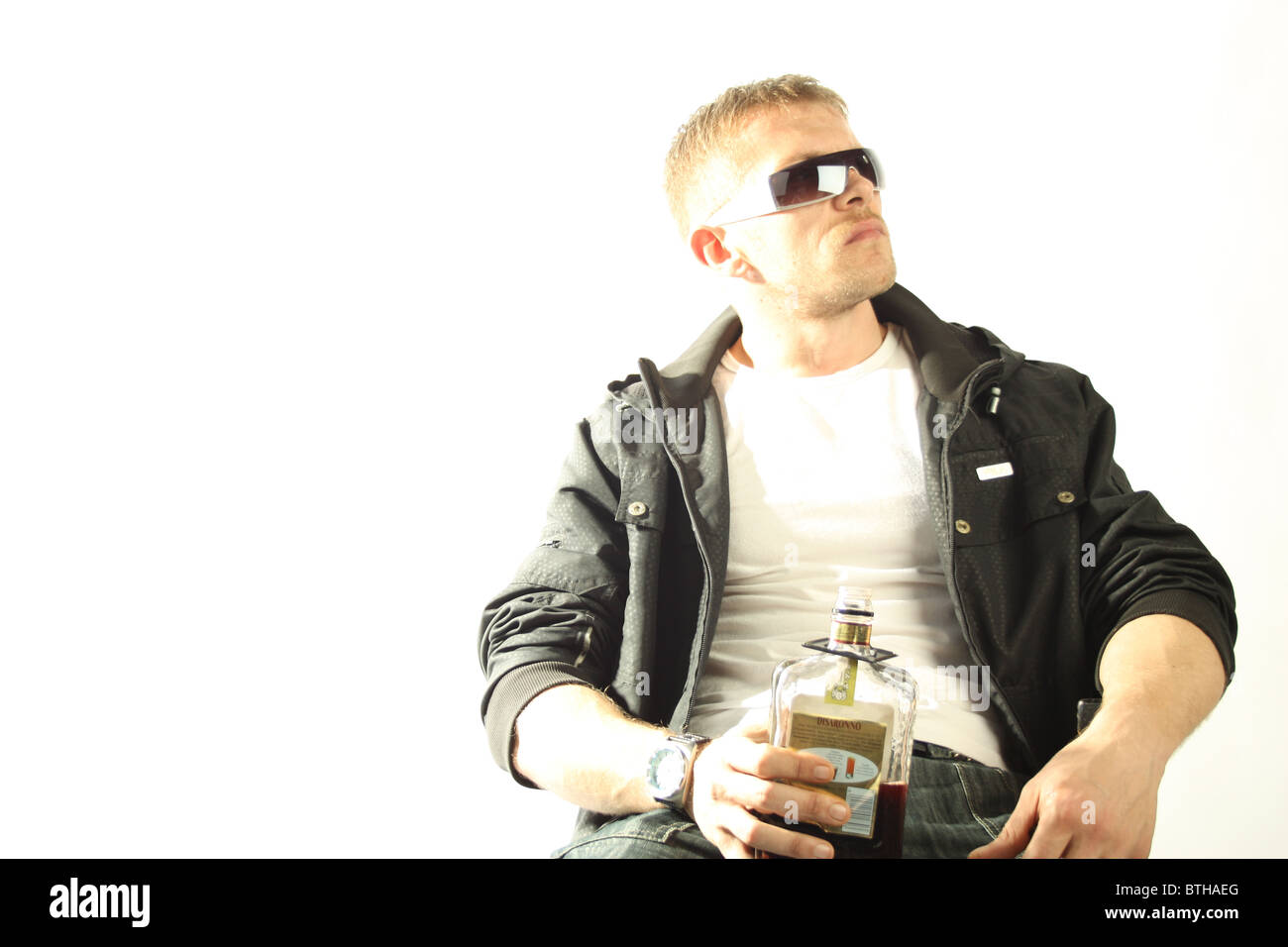 young male in studio shoot , looking well toned , modern,and healthy ...