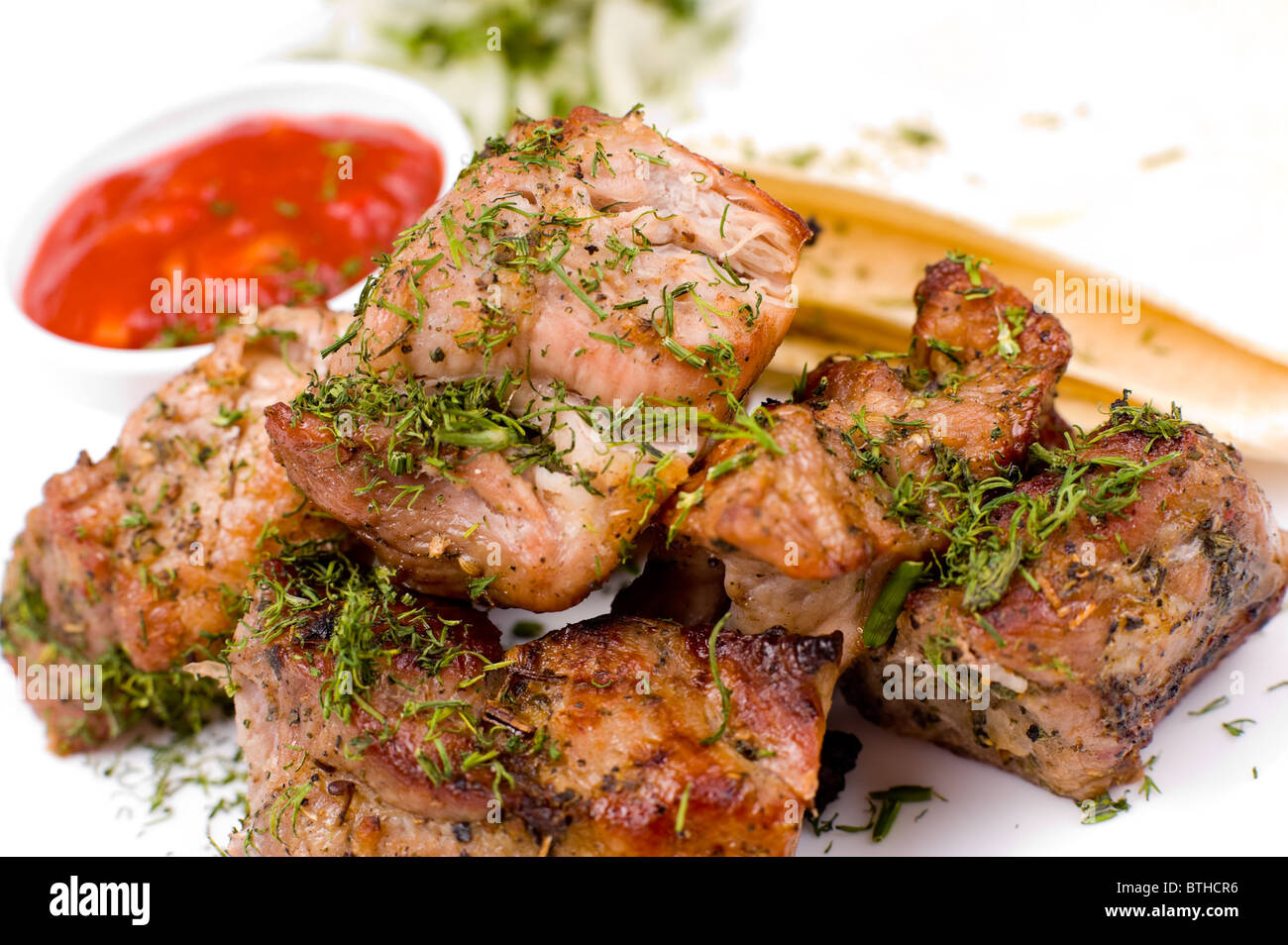 big pieces of grilled meat, macro Stock Photo - Alamy