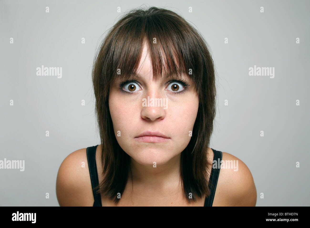 A frightened woman Stock Photo - Alamy