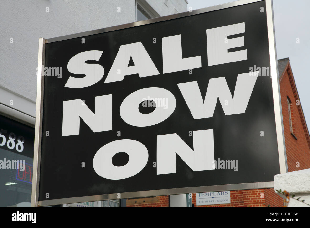 Sign for a sale Stock Photo - Alamy