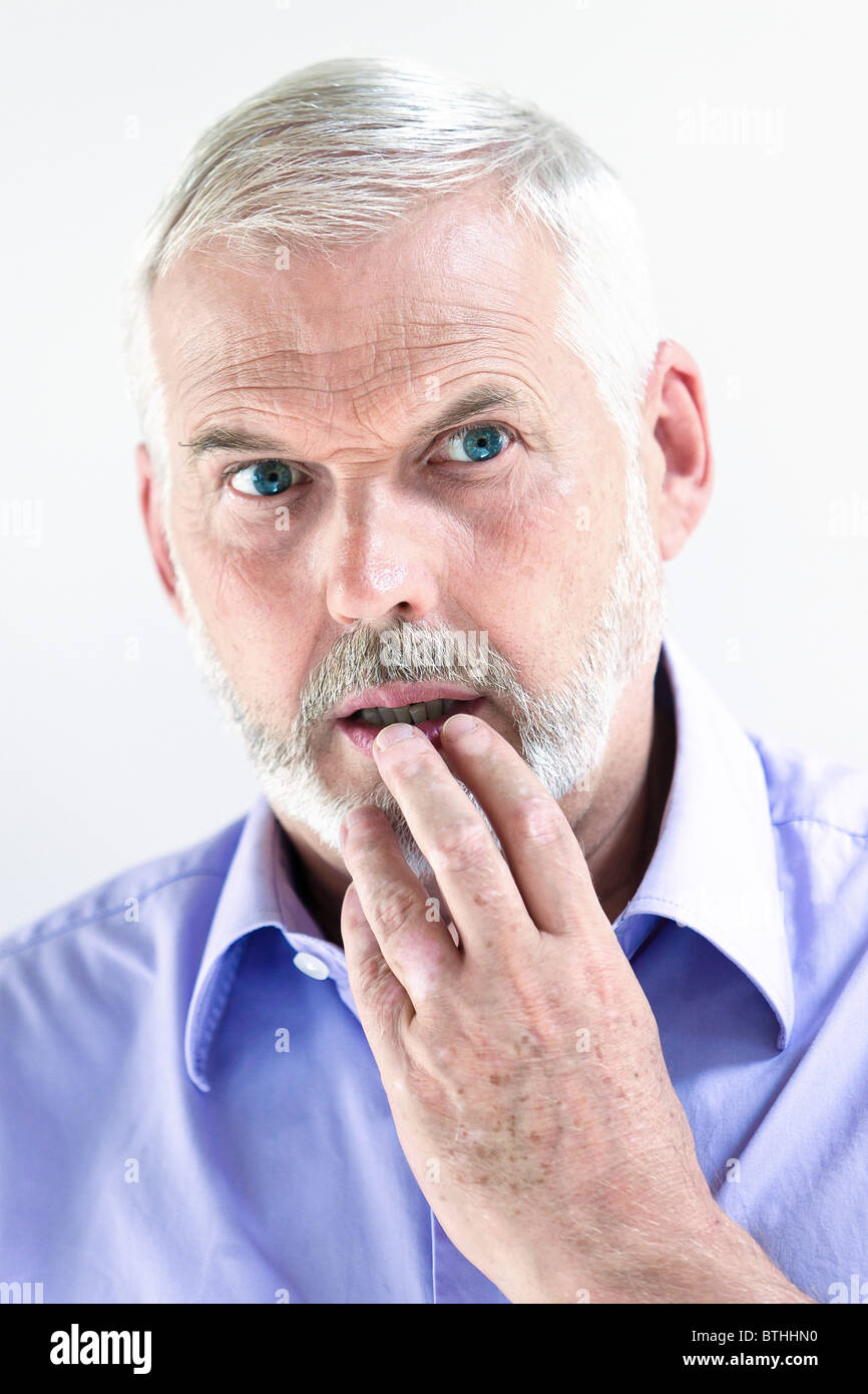 caucasian senior man portrait stun pensive isolated studio on white ...