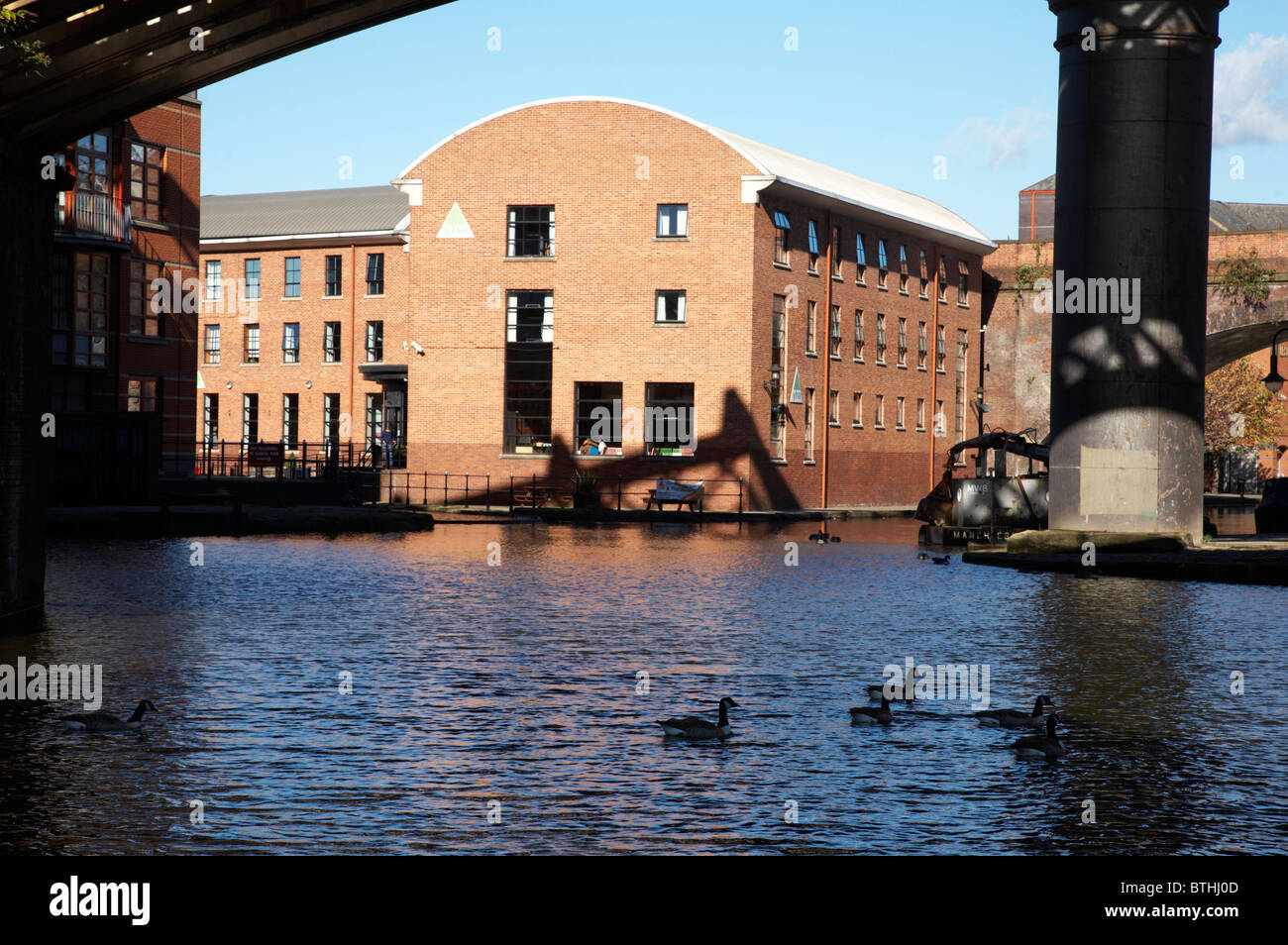 YHA with railway bridge in Castlefield UK Stock Photo - Alamy