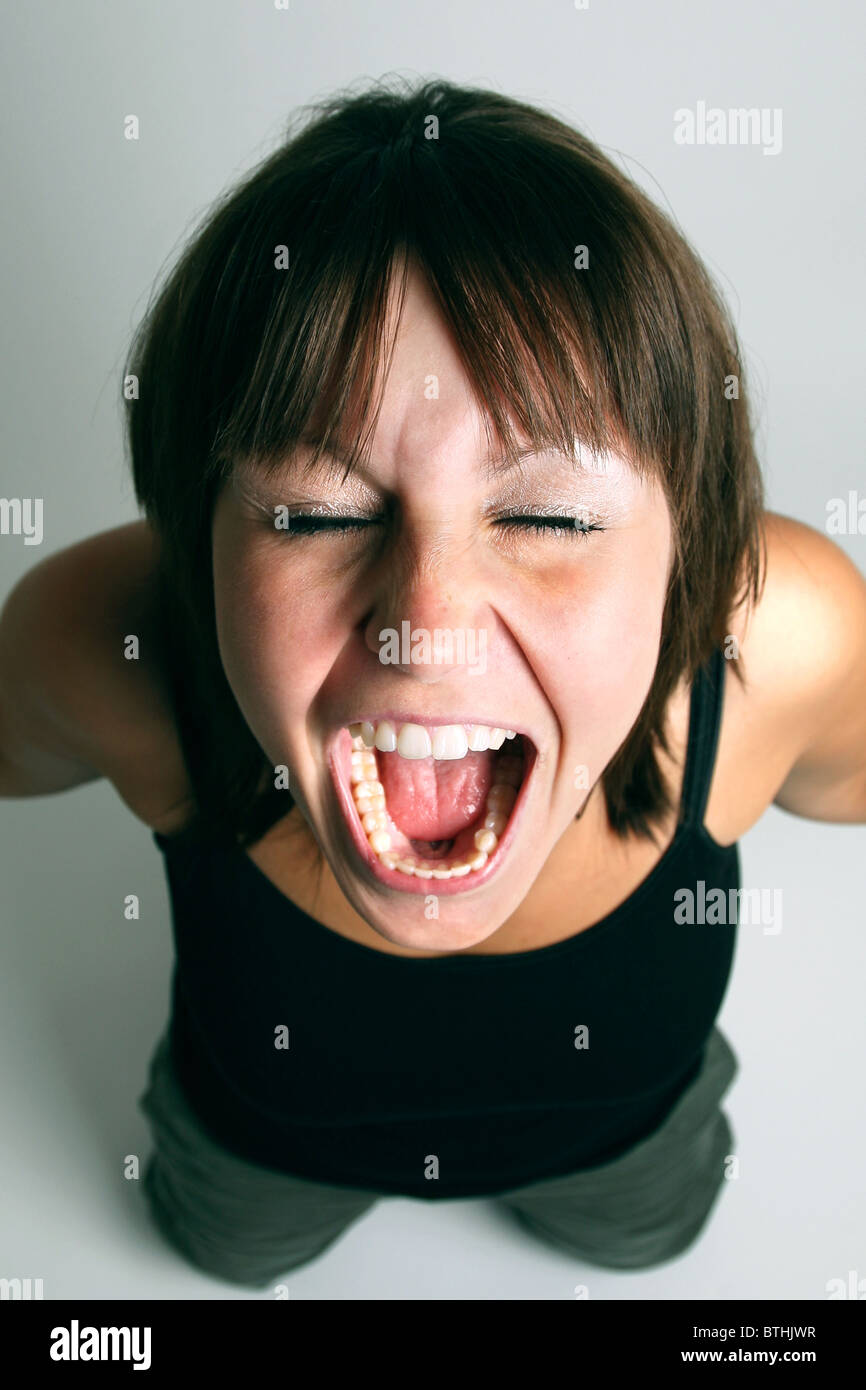 A screaming woman Stock Photo - Alamy