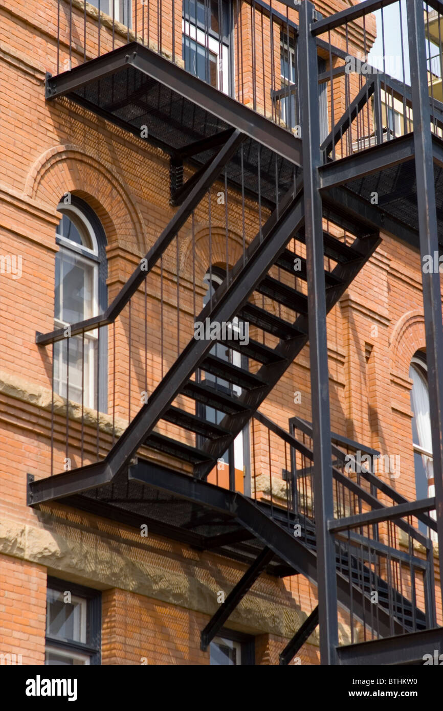 A fire escape on an old brick building Stock Photo - Alamy