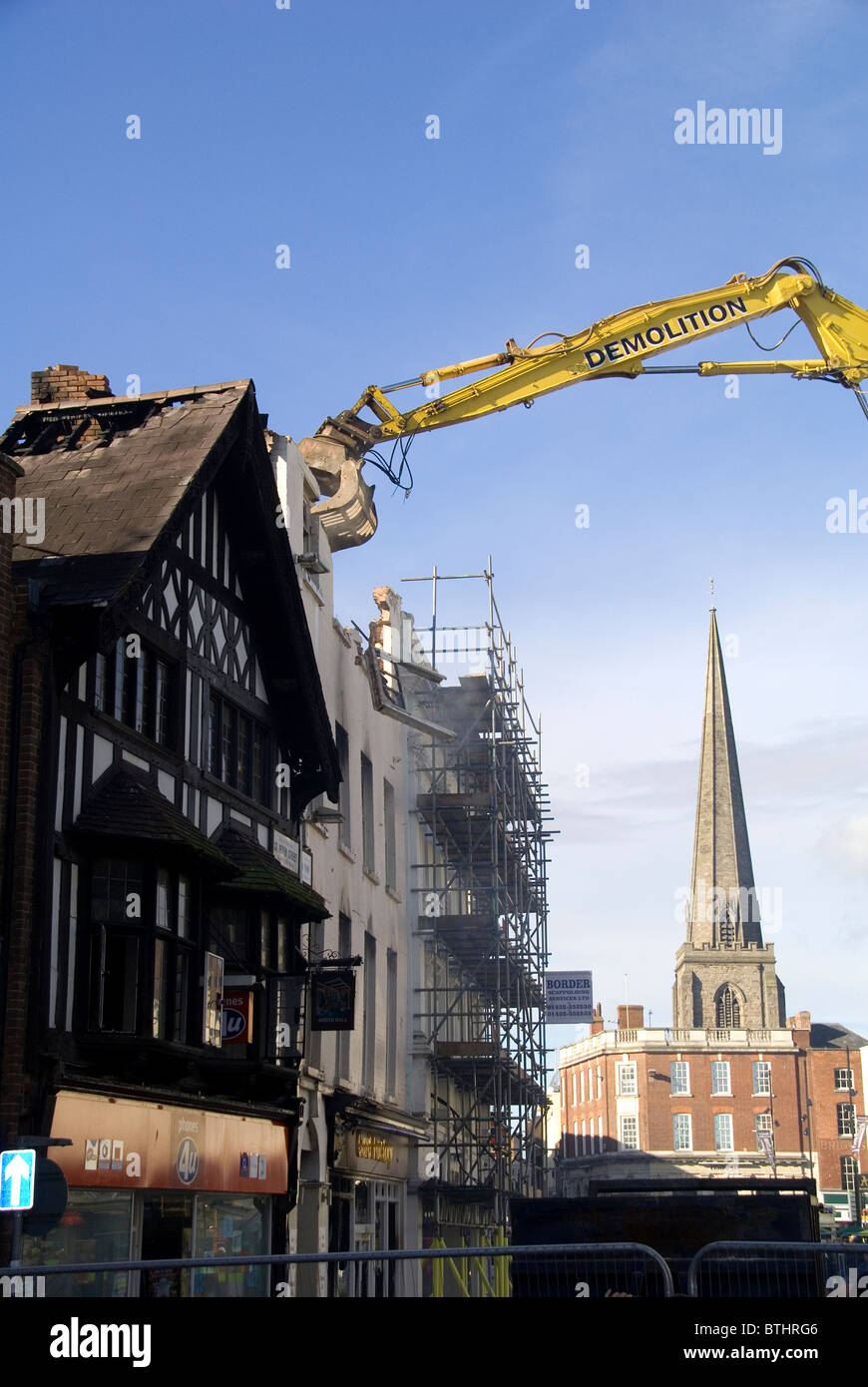 Demolition work in progress following a huge fire in the centre of ...