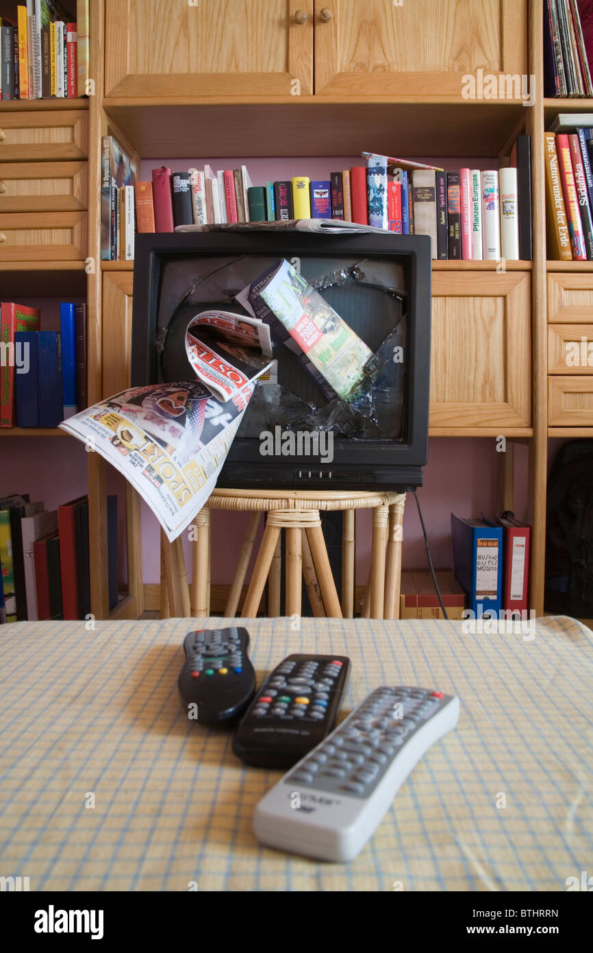 Broken television in a living room Stock Photo - Alamy