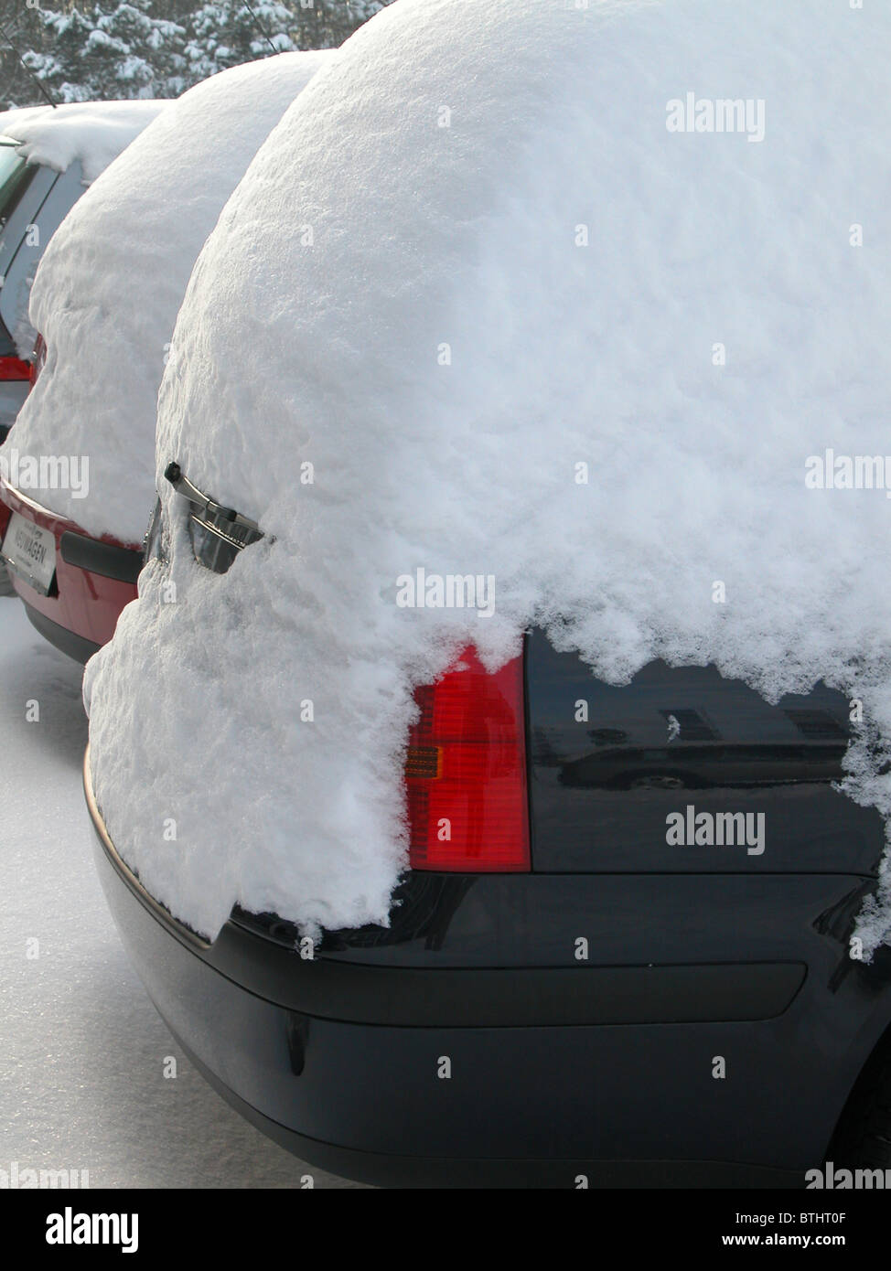 Cars in the snow Stock Photo - Alamy