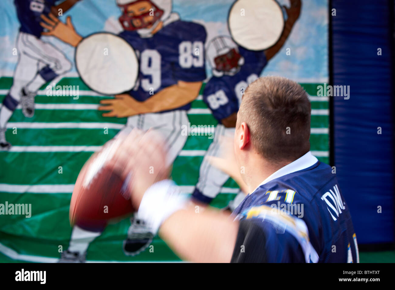 Man throws a football at the NFL fan rally in Trafalgar Square Stock ...