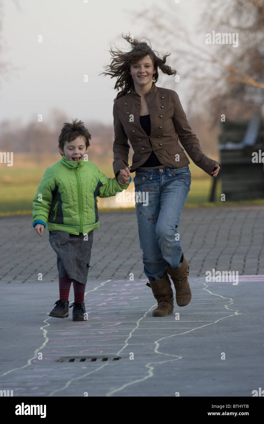 Babysitting teenage girl nanny Stock Photo - Alamy