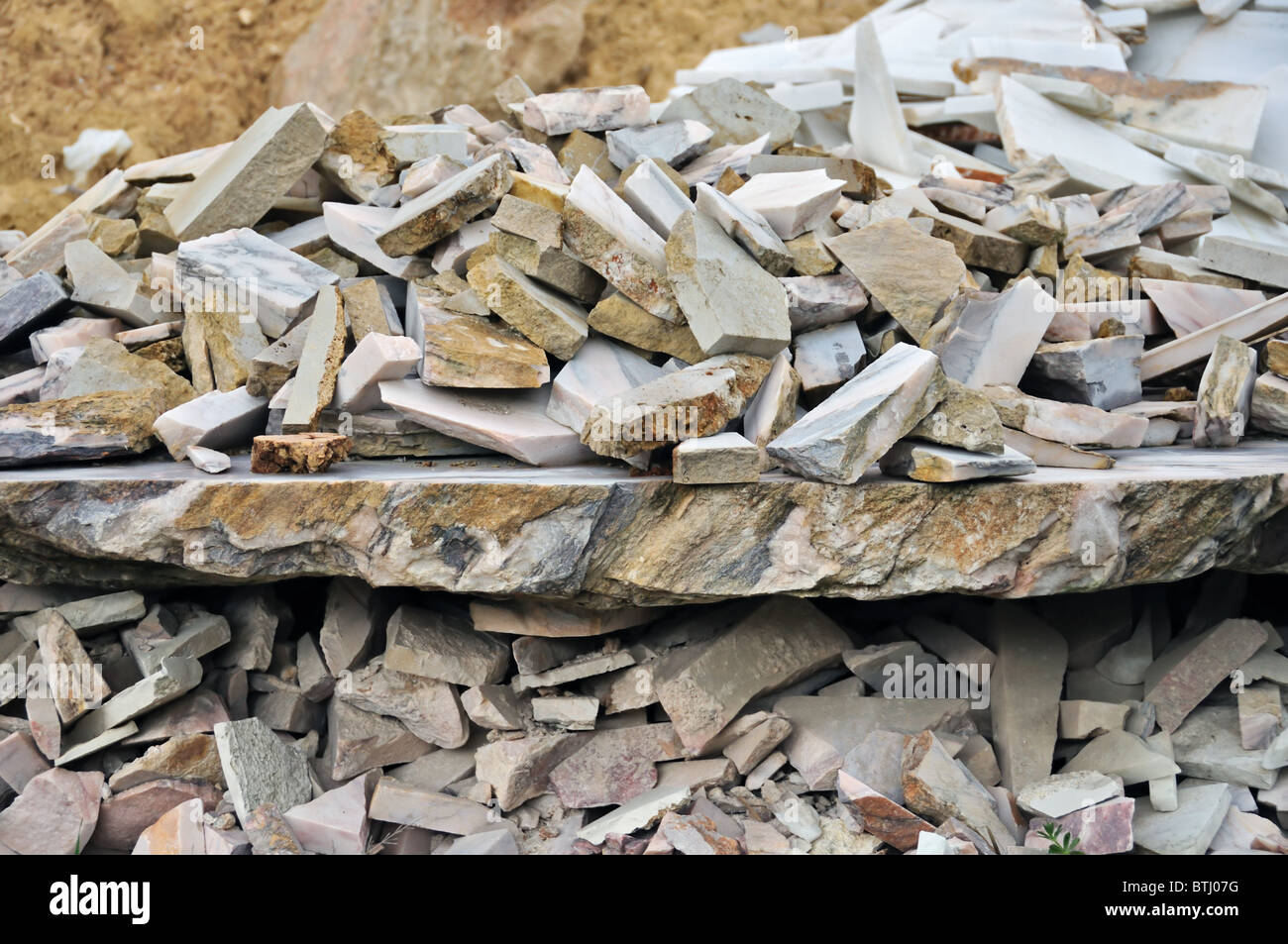 Pile of broken marble pieces from a processing factory Stock Photo - Alamy