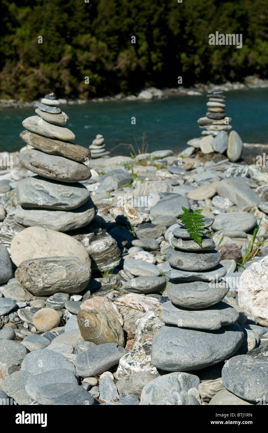 Cairns or Stacks of Rocks near a Riverside Stock Photo - Alamy