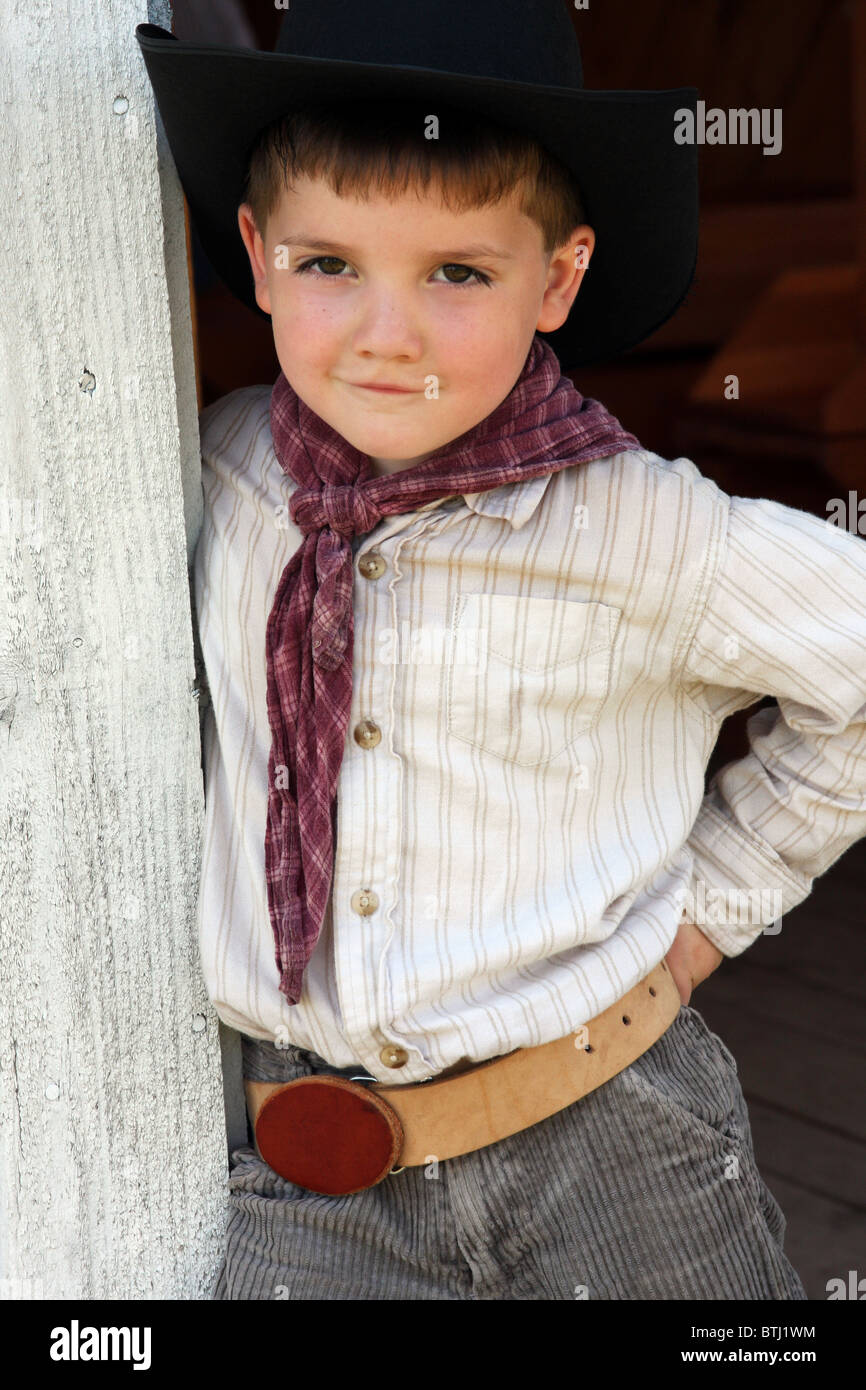 A portrait of a young cowboy in an old west town Stock Photo - Alamy