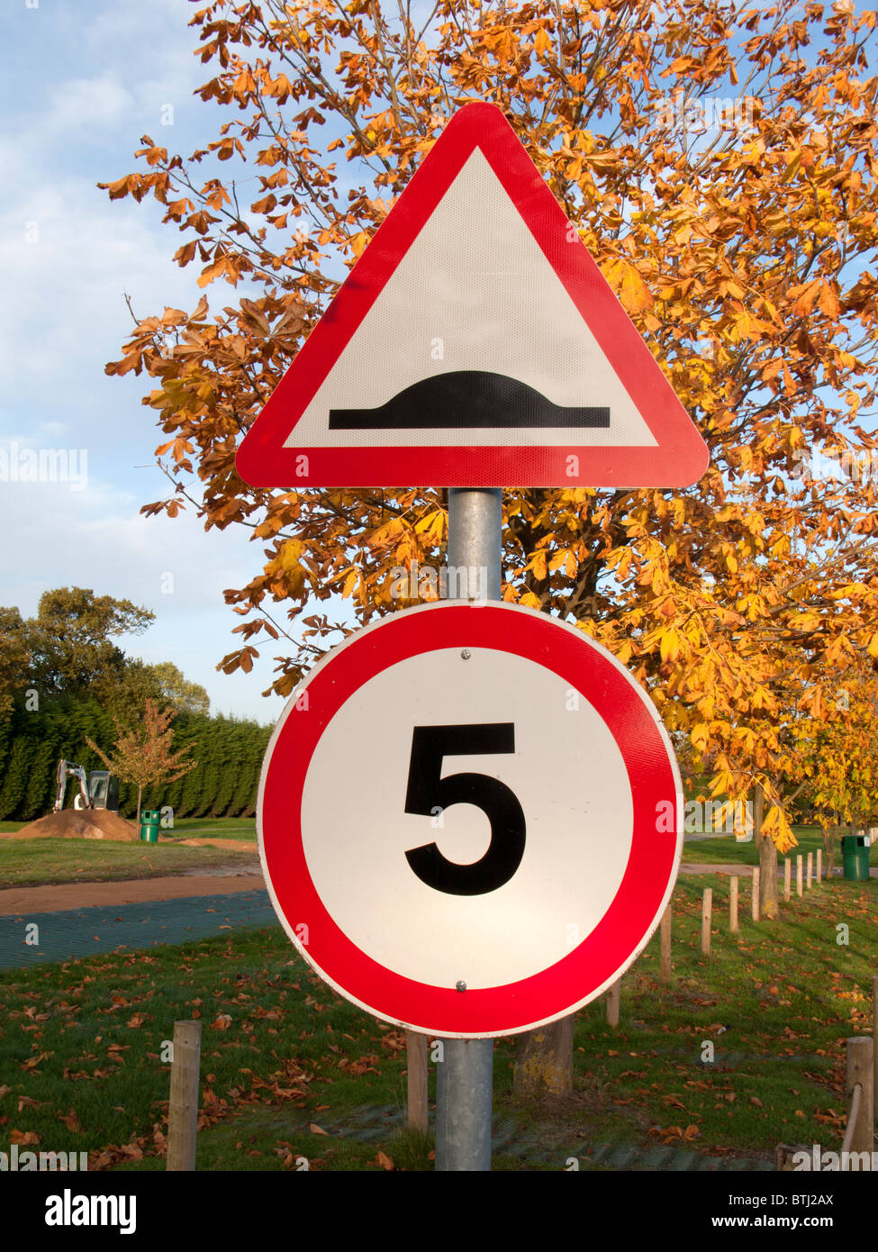 Speed Bumps Warning Sign Stock Photo - Alamy