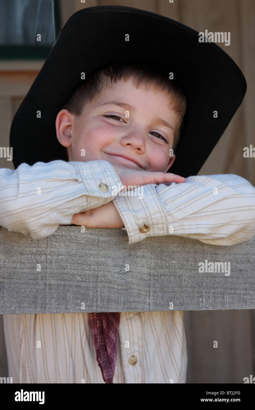 A portrait of a young cowboy in an old west town Stock Photo - Alamy