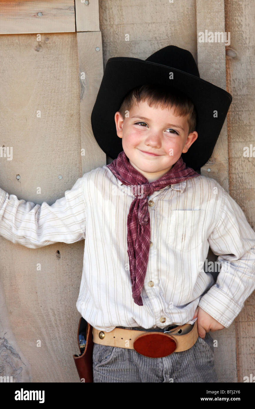 A portrait of a young cowboy in an old west town Stock Photo - Alamy