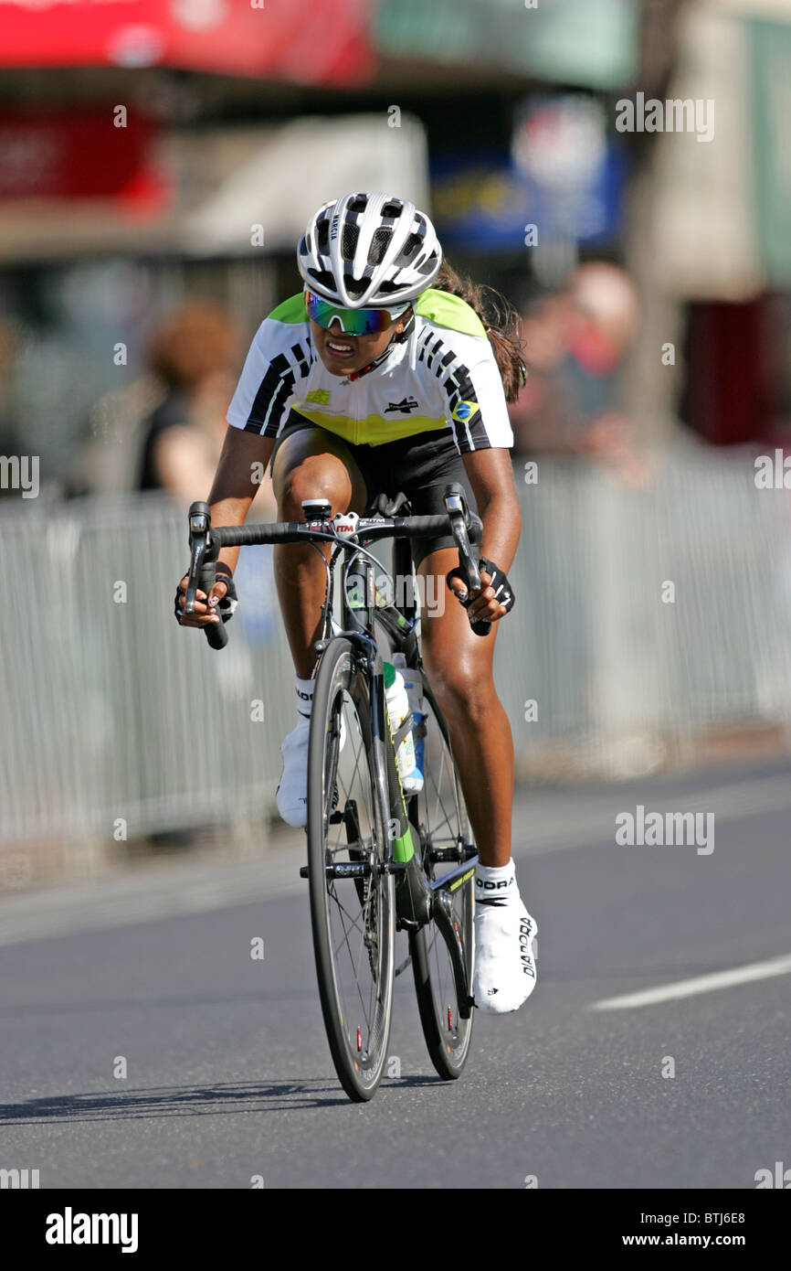 A Brazilian woman cyclists races down Packington Street during the ...