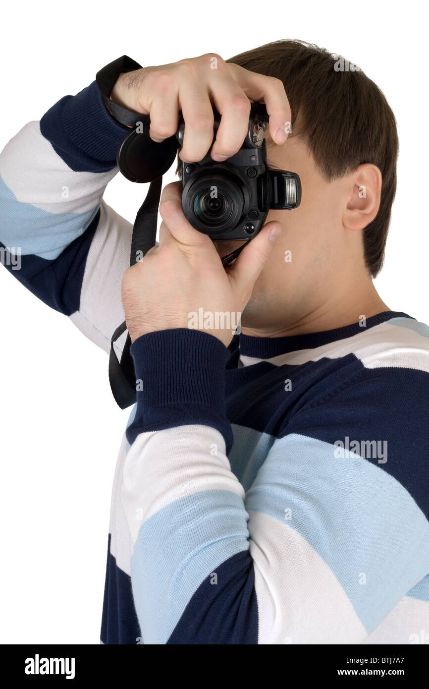 Young man with a digital camera. Isolated on white Stock Photo - Alamy