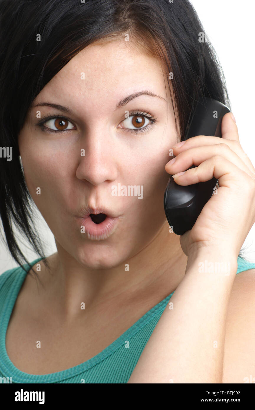 young woman is talking on a phone Stock Photo - Alamy