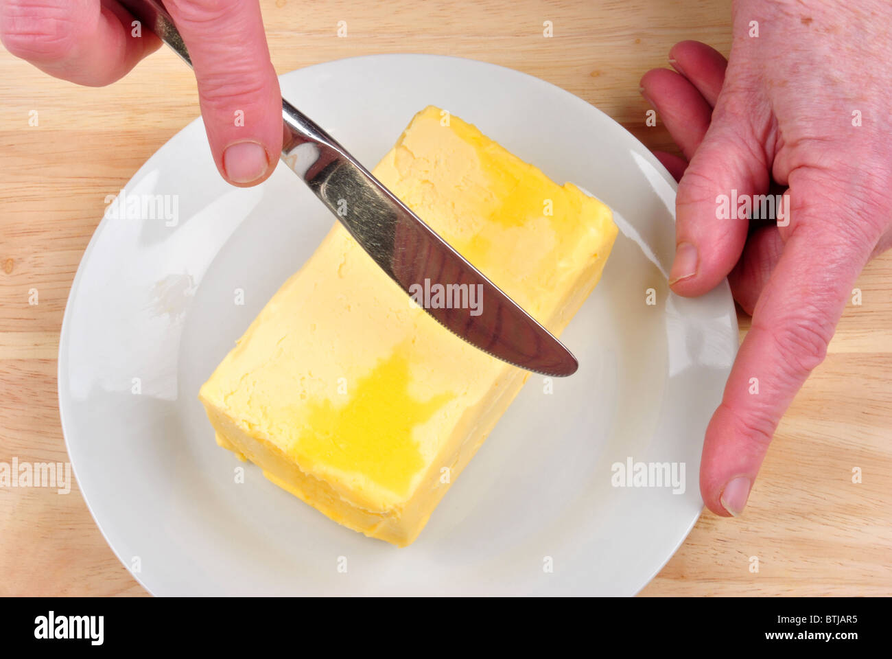 prepare some organic butter to bake a cake Stock Photo - Alamy