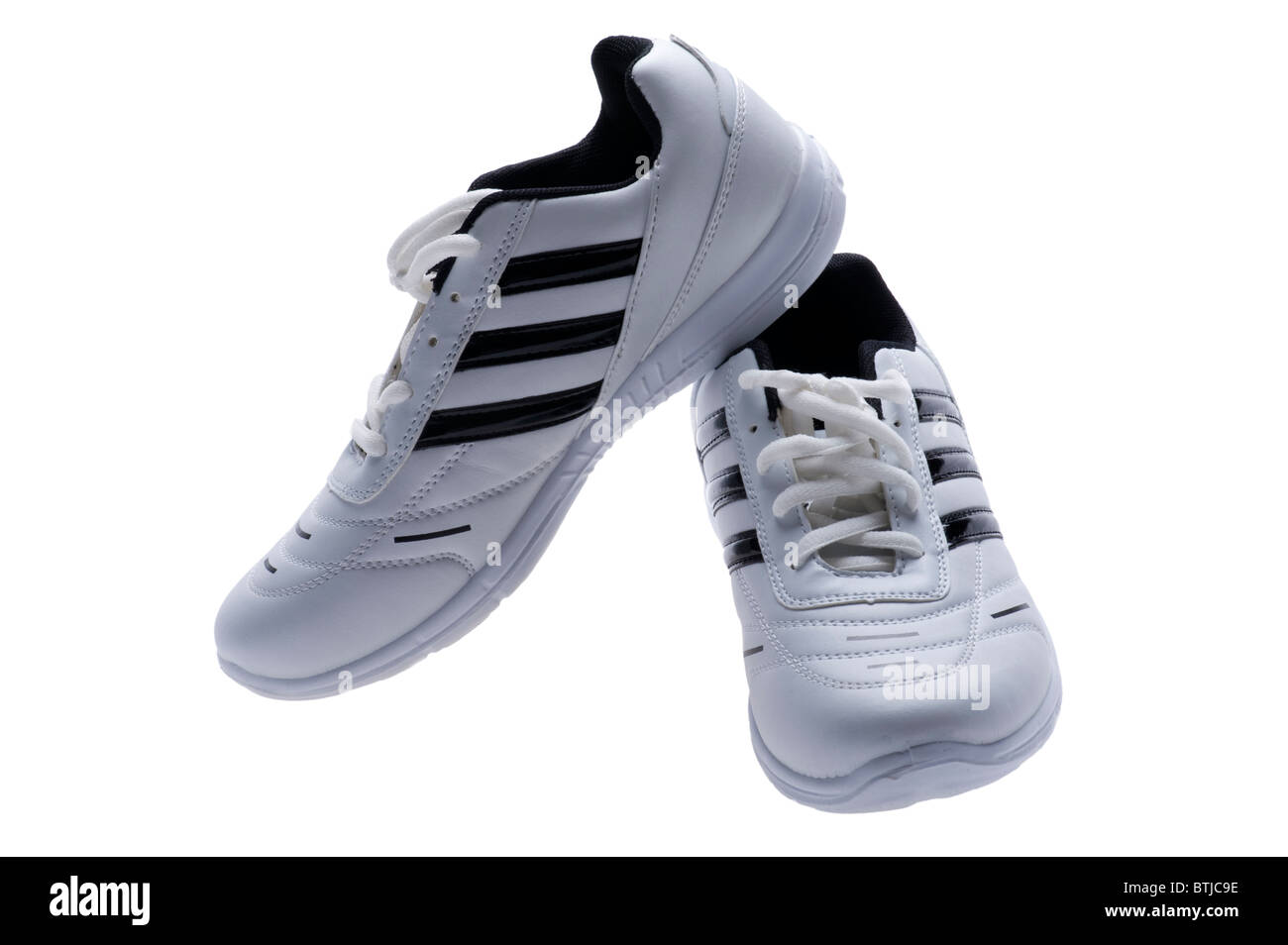 Athletic shoe on white Cut Out Stock Images & Pictures - Alamy