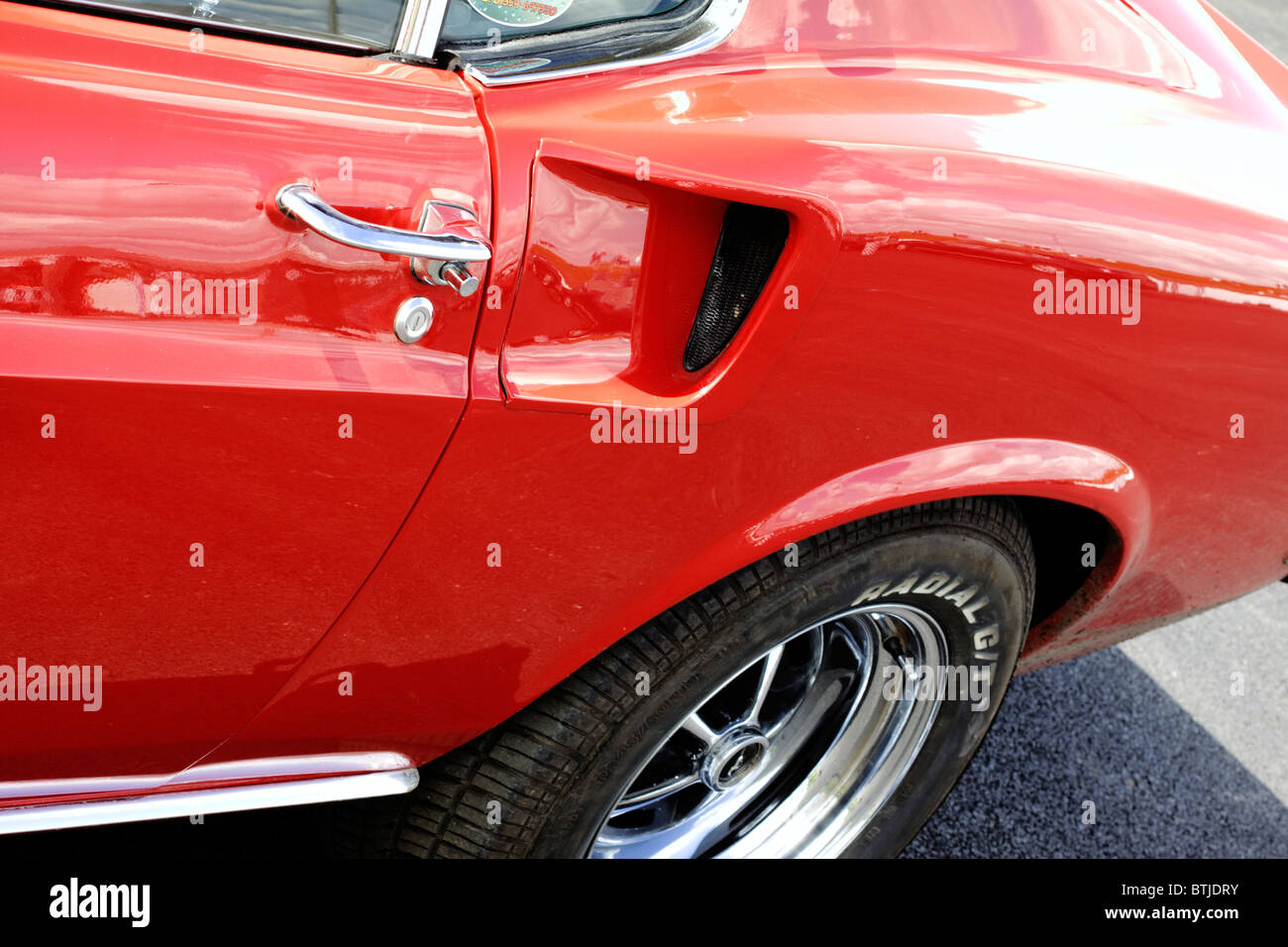 A Wing of a Red Mustang At Santa Pod Raceway England Stock Photo - Alamy