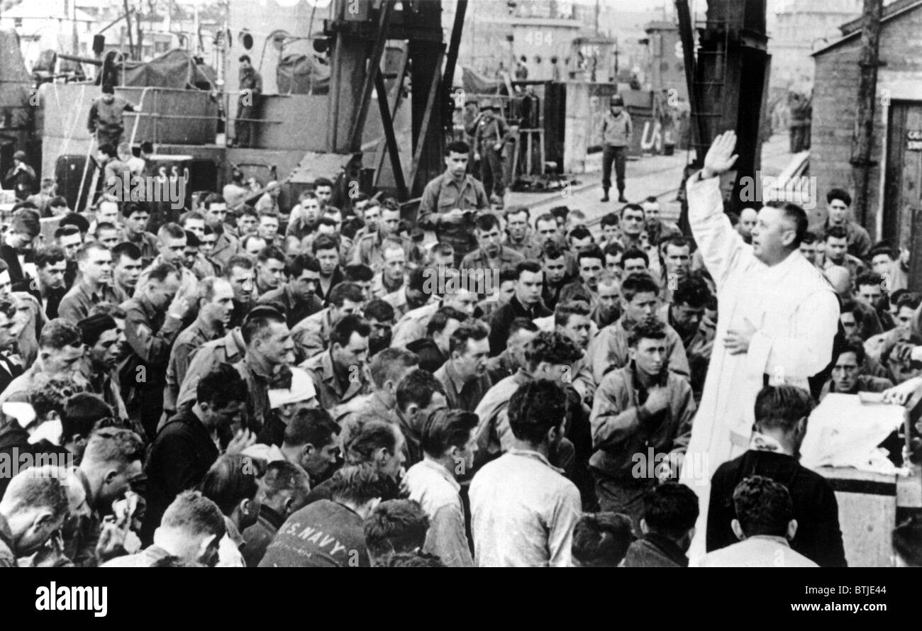 Father Edward Waters (right), conducts dockside services for the 1st ...