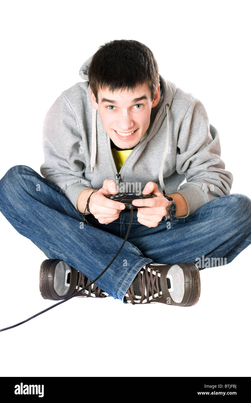 Young man with a joystick for game console. Isolated Stock Photo - Alamy