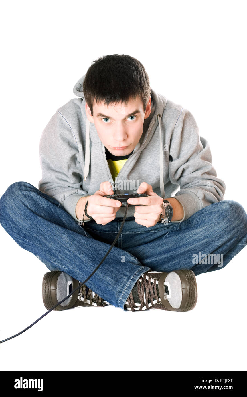 Young man playing computer game Cut Out Stock Images & Pictures - Alamy