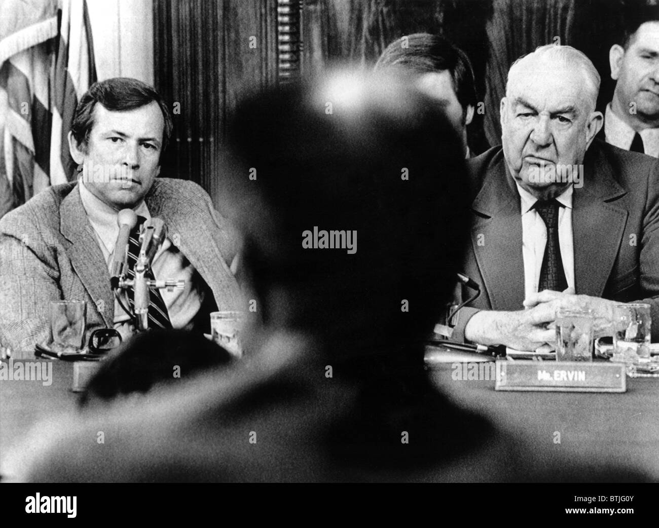 Sen. Howard Baker, Sen. Sam Ervin, listening to former Chief of Staff H ...