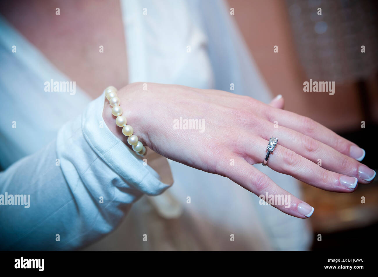 Woman showing her ring Stock Photo - Alamy