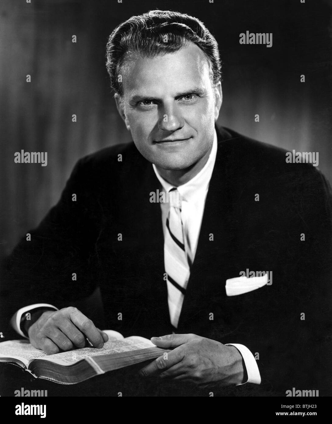Billy Graham . Evangelist with Bible. Born 11/7/18 in publicity photo ...