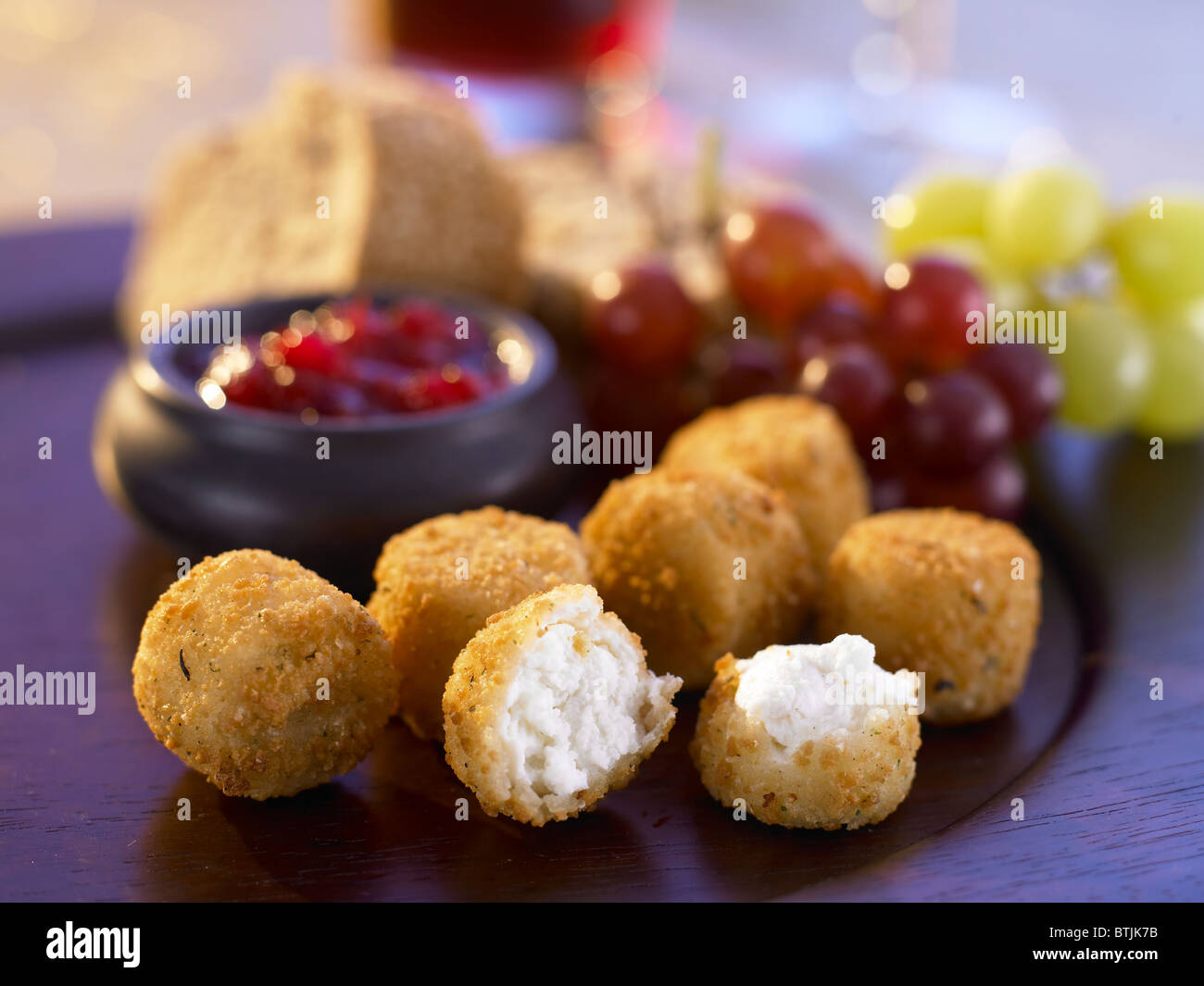herb coated goats cheese balls Stock Photo - Alamy