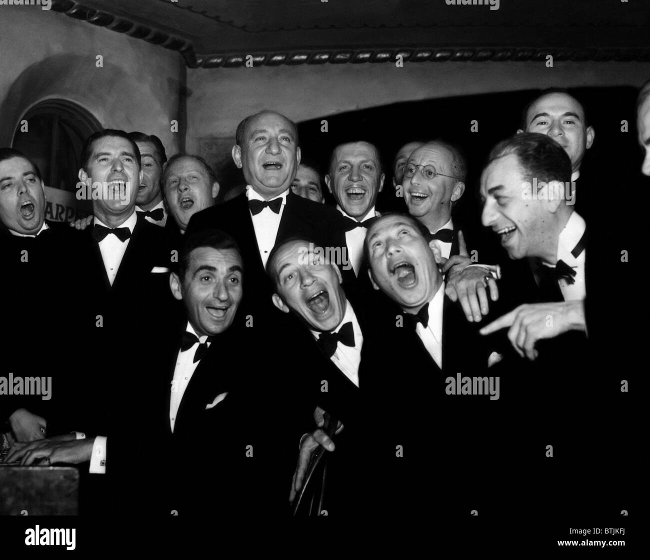Irving Berling (at piano), Chico Marx and Harpo Marx (next to him ...