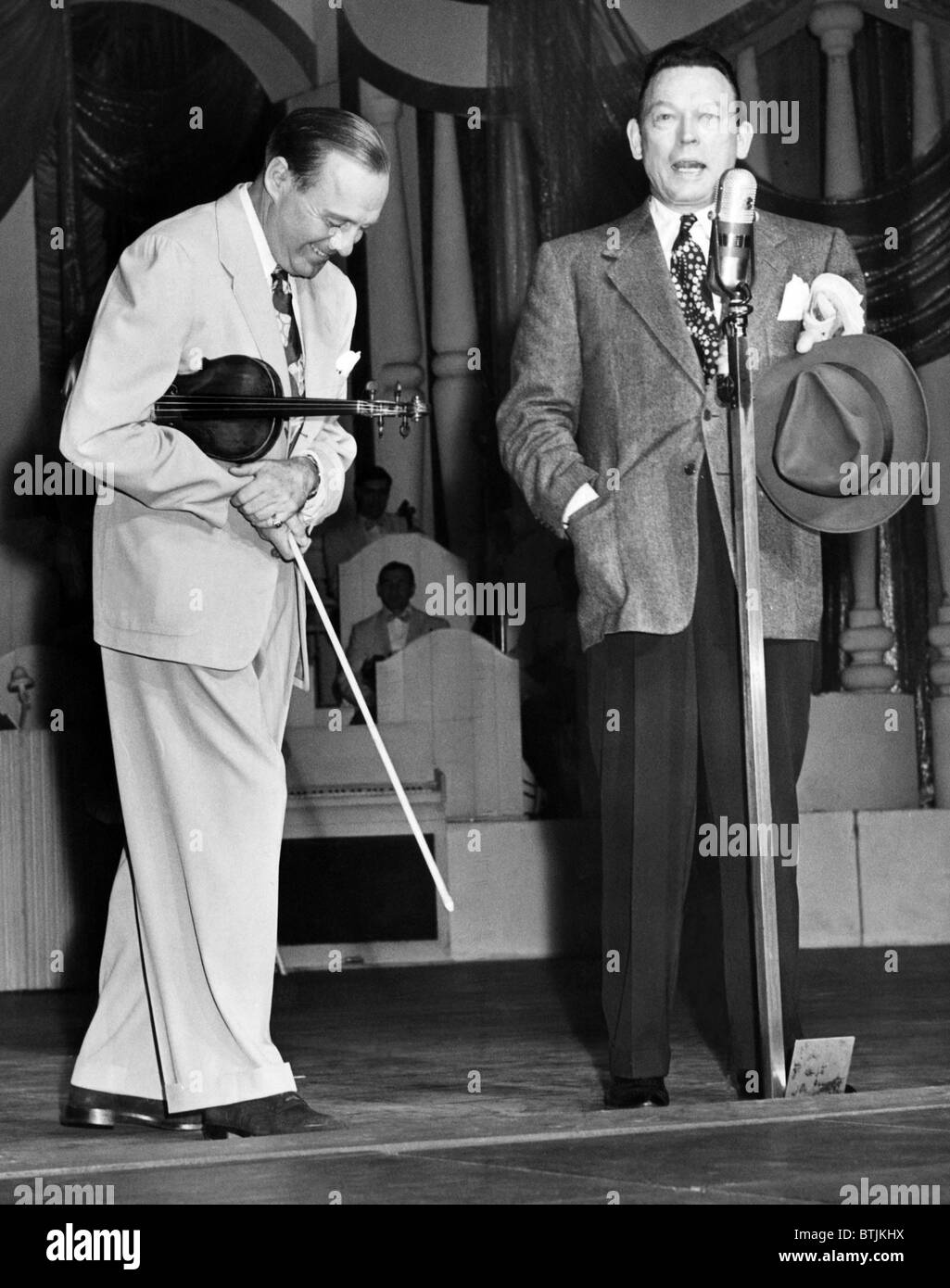 Fred Allen (right) interrupts Jack Benny's performance at the Roxy ...