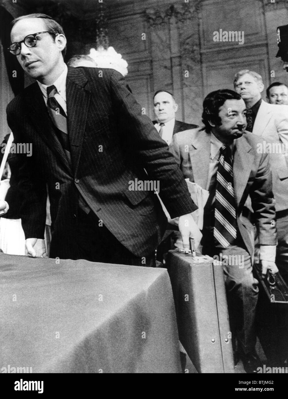 John W. Dean III (left), Robert McCandless (3rd from left), leaving ...