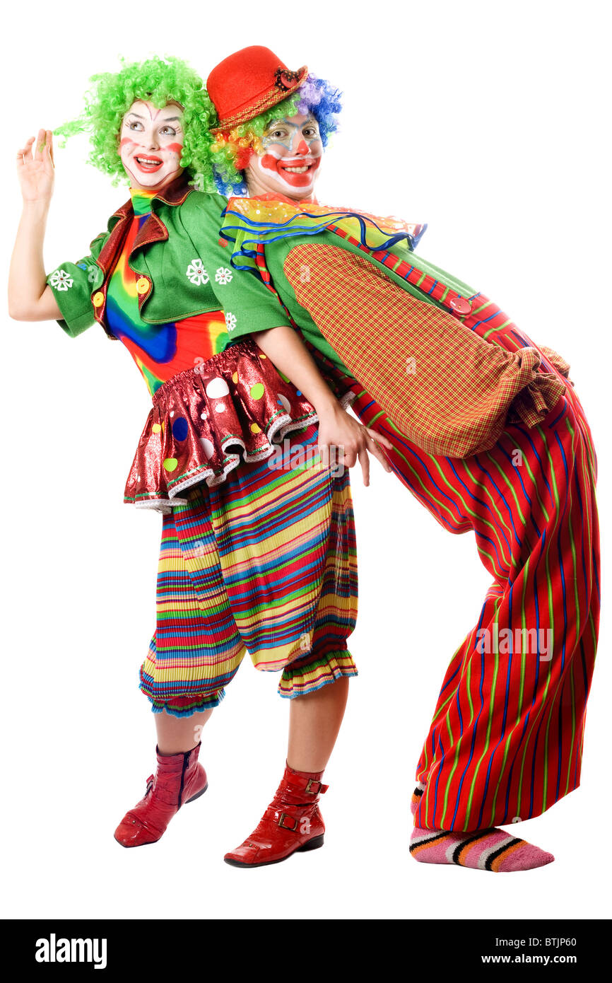 Two clowns are back to back. Isolated on white Stock Photo - Alamy