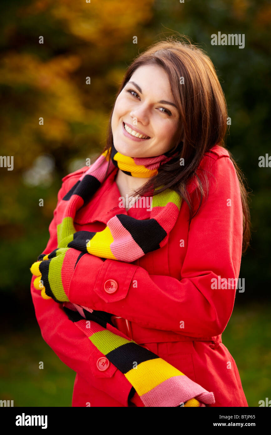 Girl wearing coat and scarf Stock Photo - Alamy