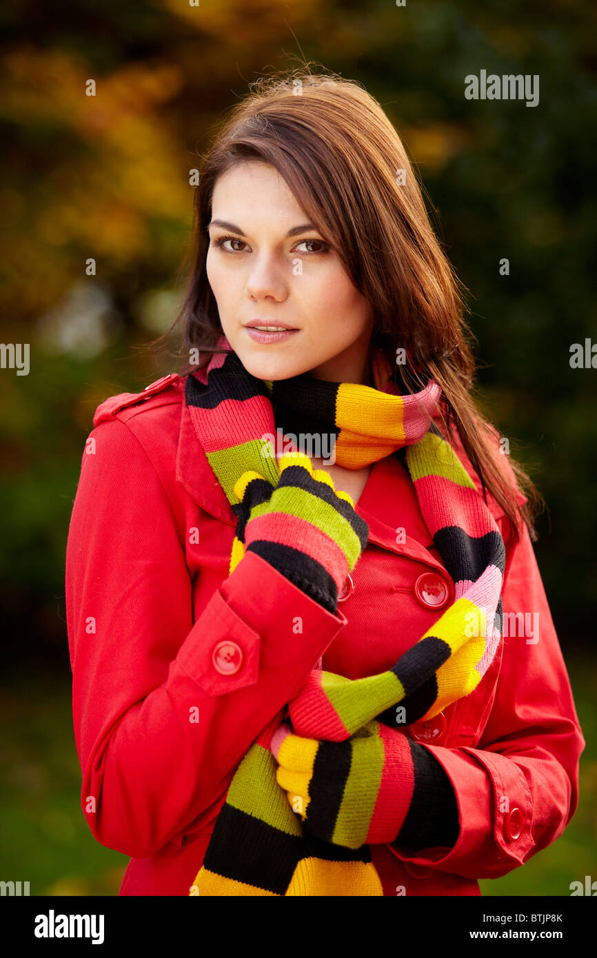 Girl wearing coat and scarf Stock Photo - Alamy