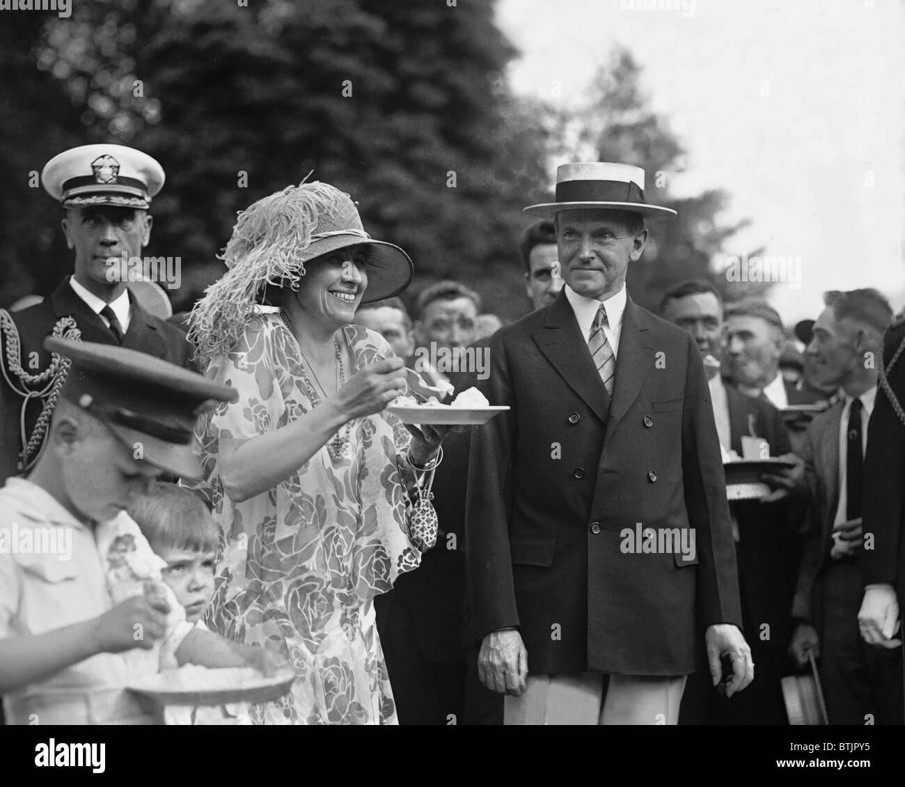 President Calvin Coolidge (1872-33) smiles along with his wife at a ...