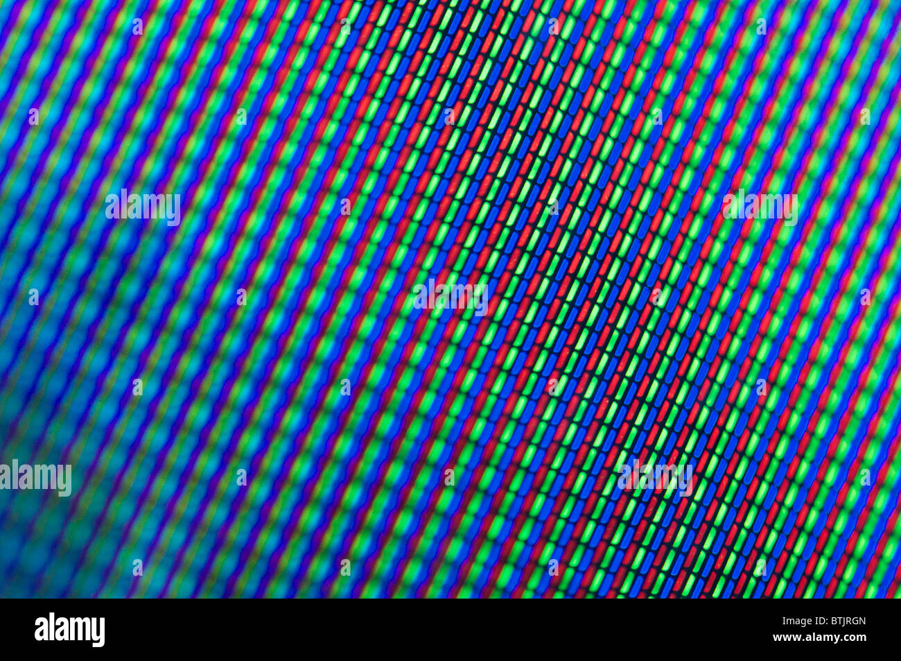 A micro photo of the face of a traditional television set. The red blue ...