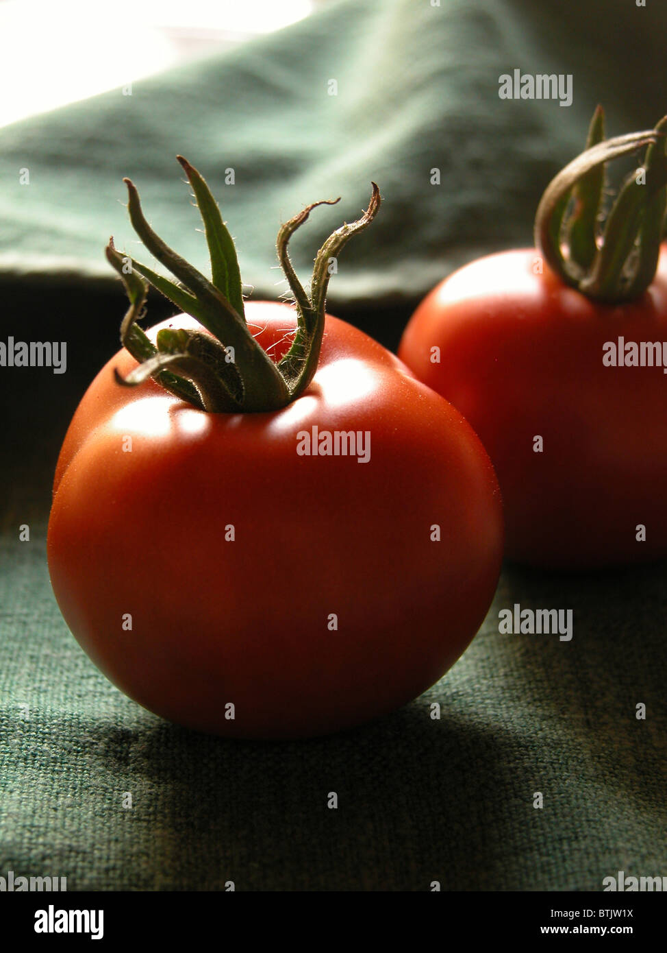 2 red tomatoes hi-res stock photography and images - Alamy